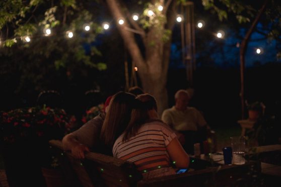 Family Outside at Night on Patio | picXclicX | Free Stock Photos you ...